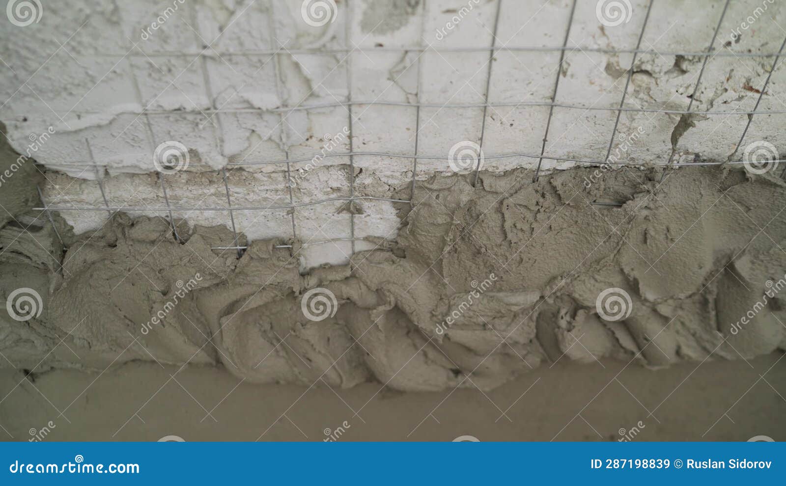 Cement Fixing Mesh Attached To a Rough Cement Wall. Application of ...