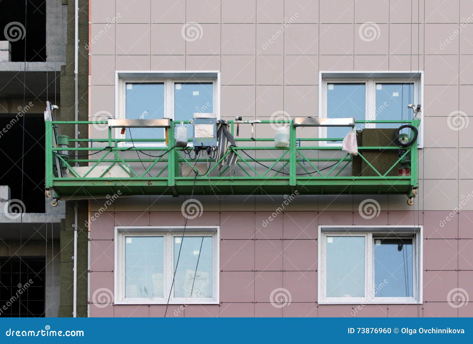 Construction Suspended Cradle. Construction Cradle With Workers On The ...