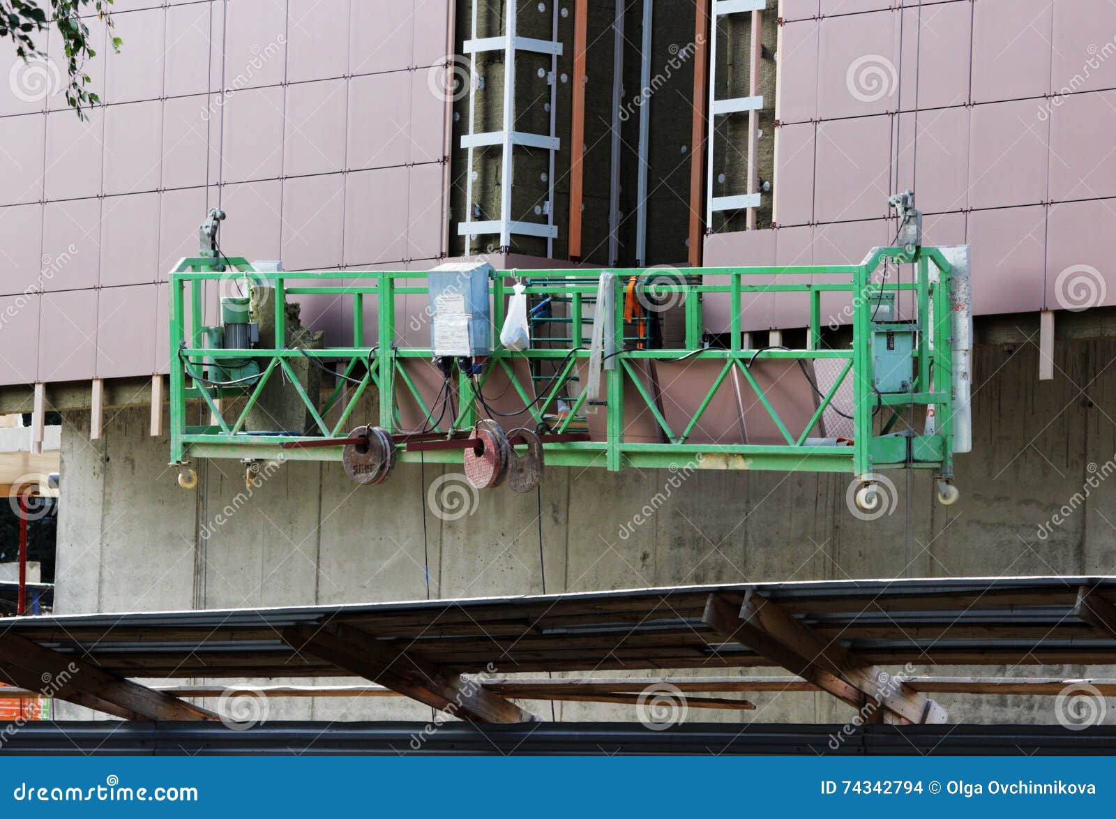 Construction Suspended Cradle. Construction Cradle With Workers On The ...