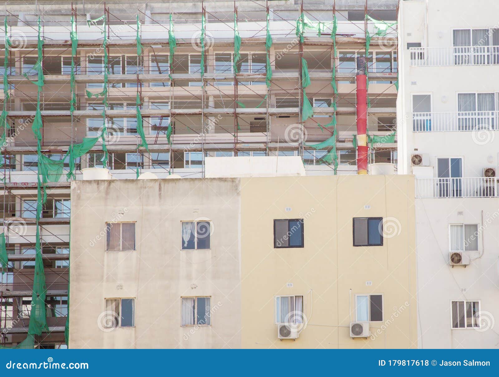 Construction on a Tall Building Taking Place Stock Photo - Image of ...