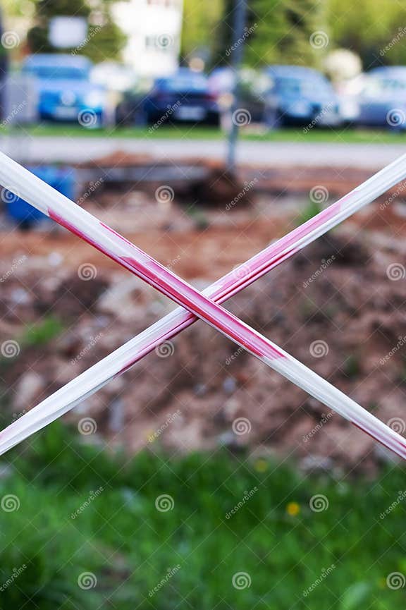 Construction Tape Cross at a Construction Site Stock Image - Image of ...