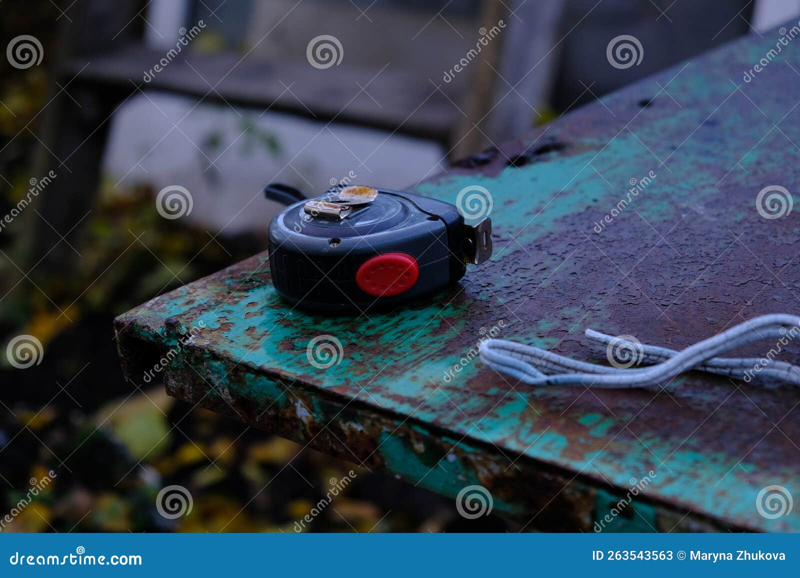 Construction Tape Measure on the Table. a Tool for Measuring Distance ...