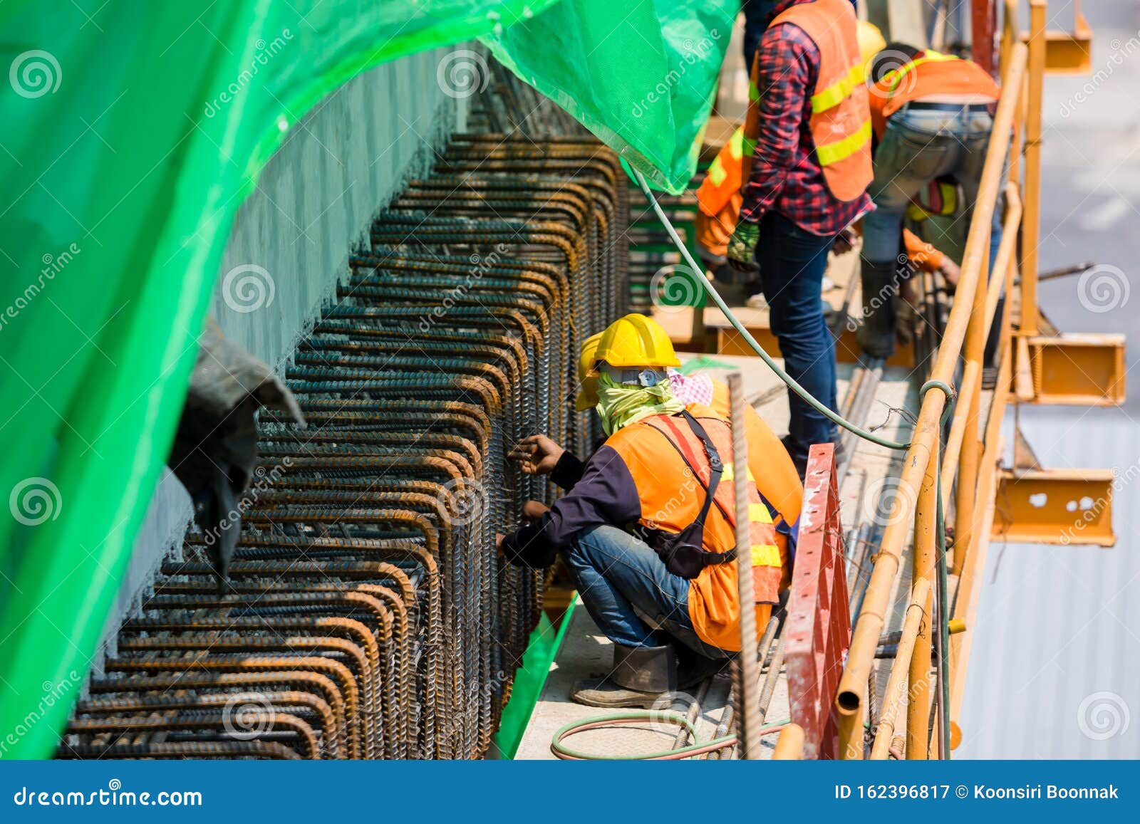 Construction Team Working at Height Site. Construction Workers ...