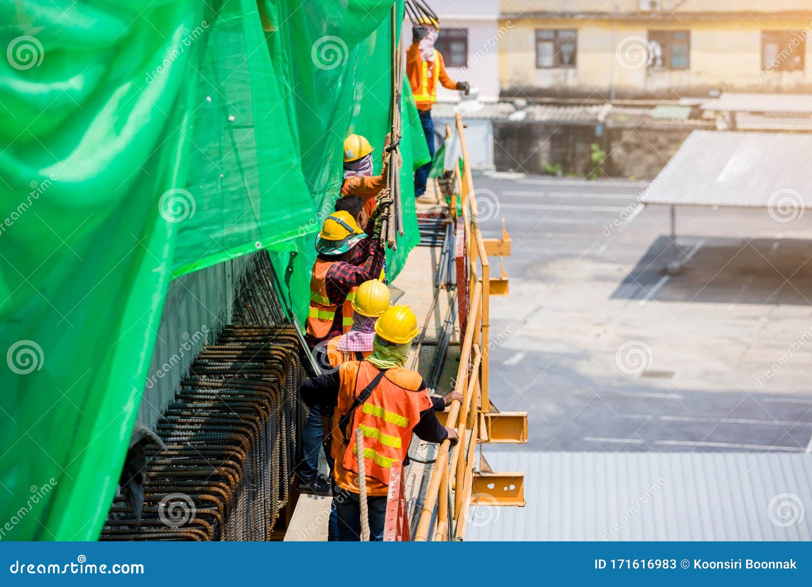 Construction Team Working at Height Site. Construction Workers ...