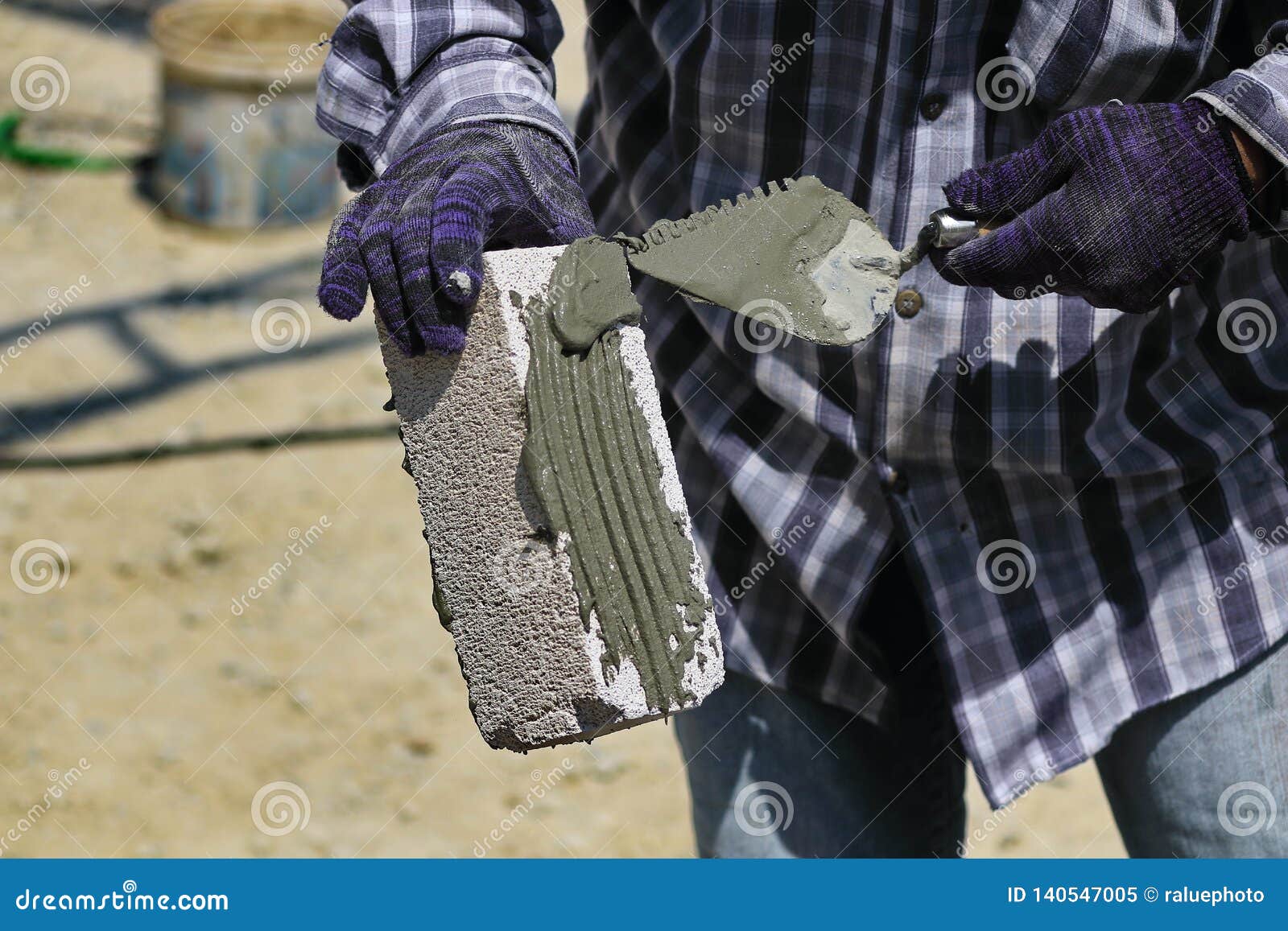 Construction Technicians are Building Brick Walls with Lightweight ...