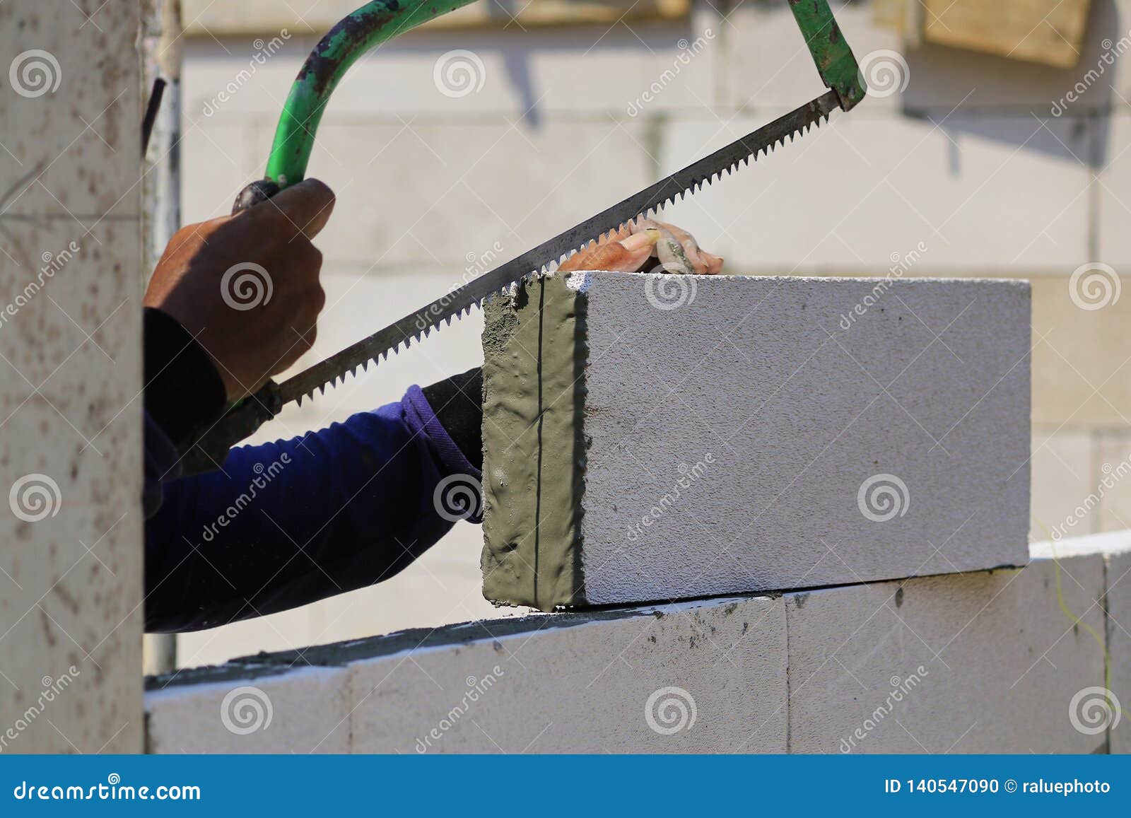 Construction Technicians are Building Brick Walls with Lightweight ...