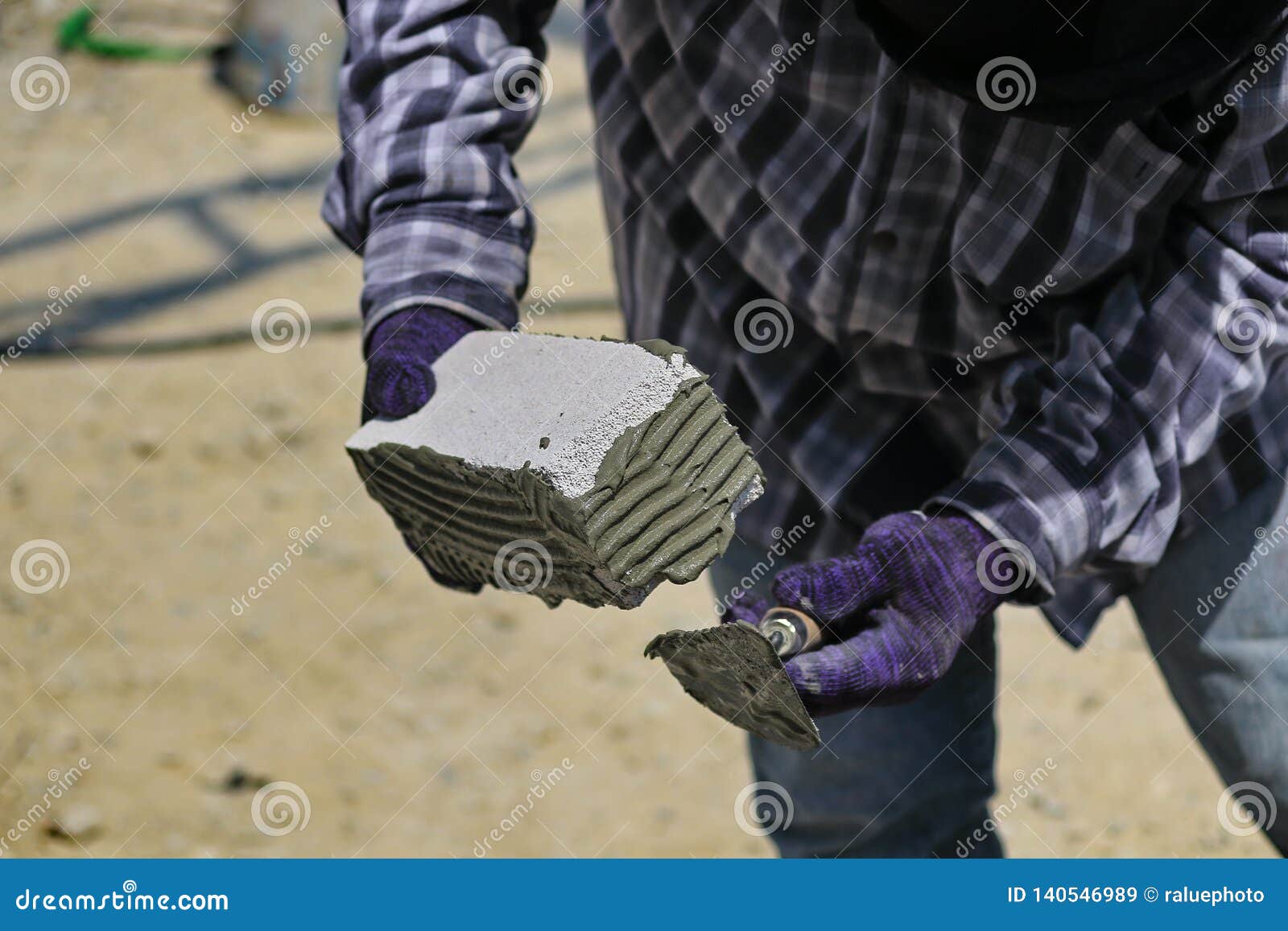 Construction Technicians are Building Brick Walls with Lightweight ...