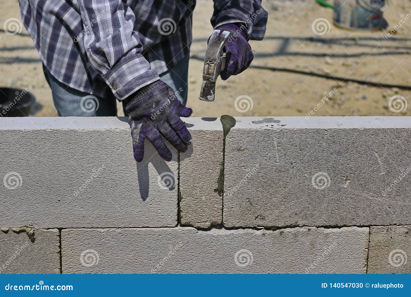 Construction Technicians are Building Brick Walls with Lightweight ...
