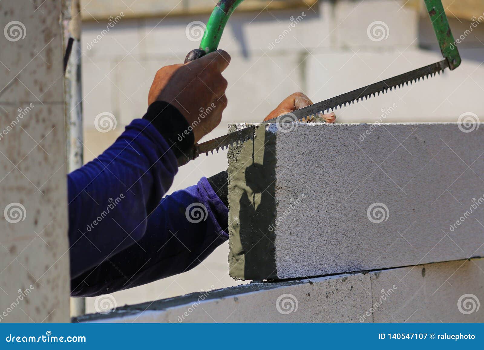 Construction Technicians are Building Brick Walls with Lightweight ...