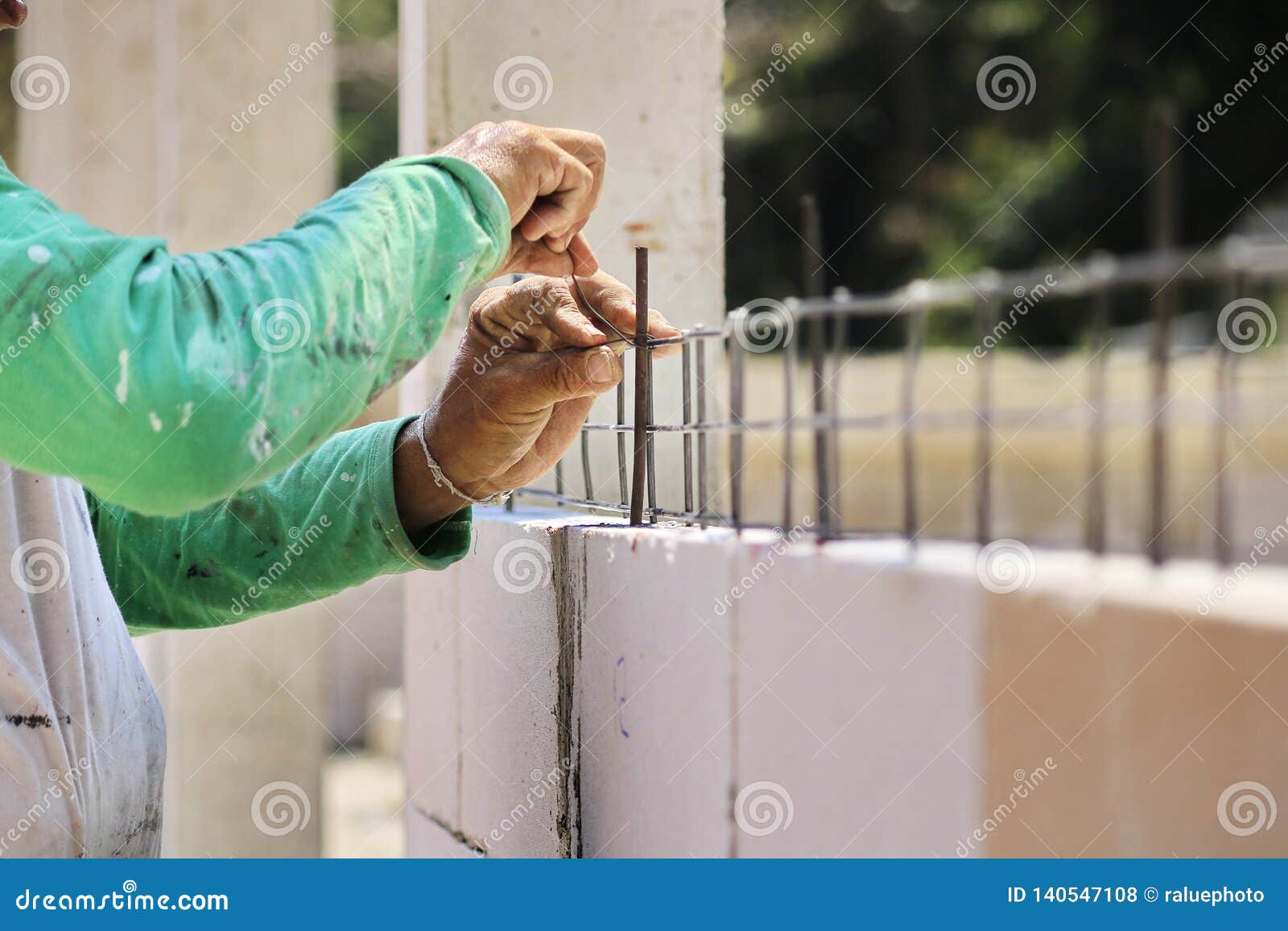 Construction Technicians are Building Brick Walls with Lightweight ...
