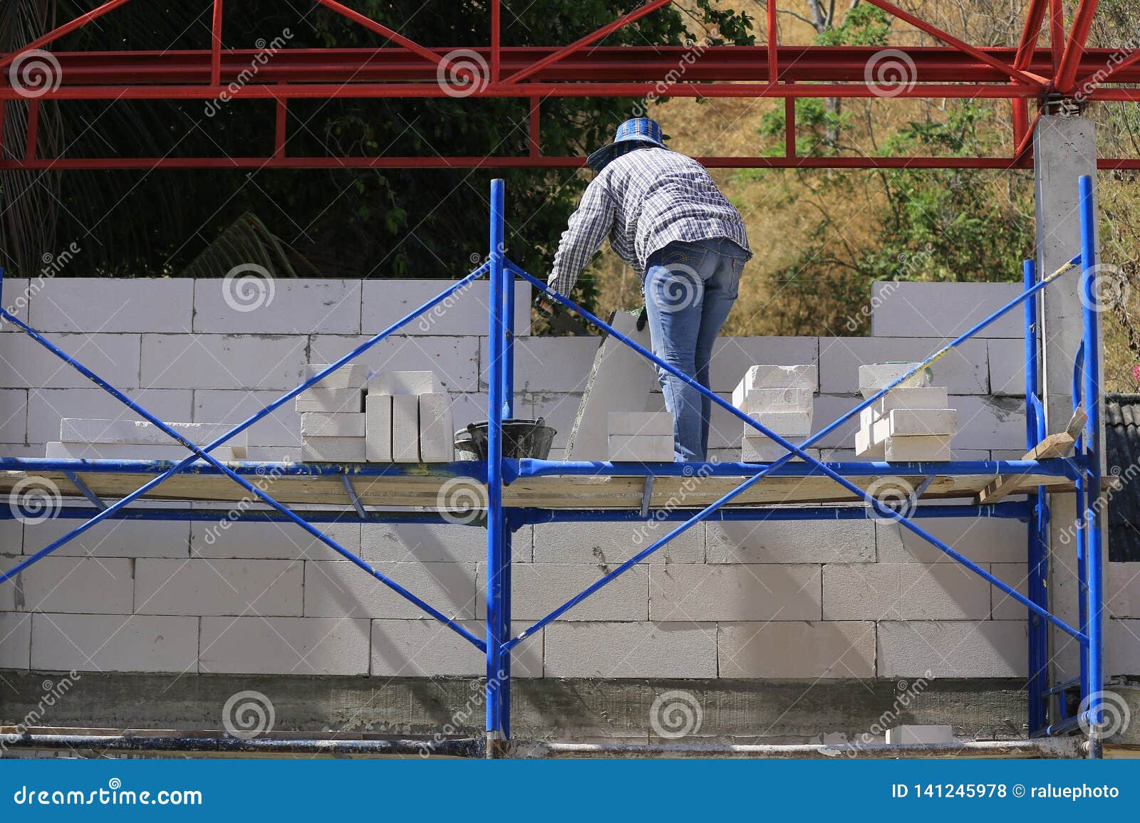 Construction Technicians are Building Brick Walls with Lightweight ...