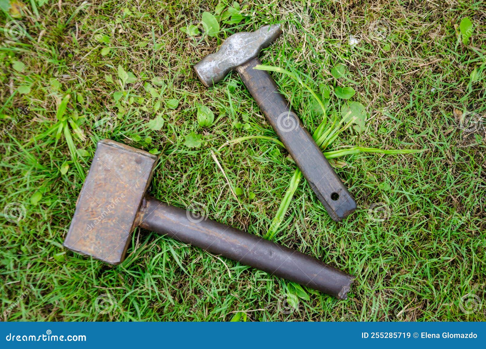 The Sledgehammer Is Lying On The Sand. A Large Hammer Lies On The Sandy ...