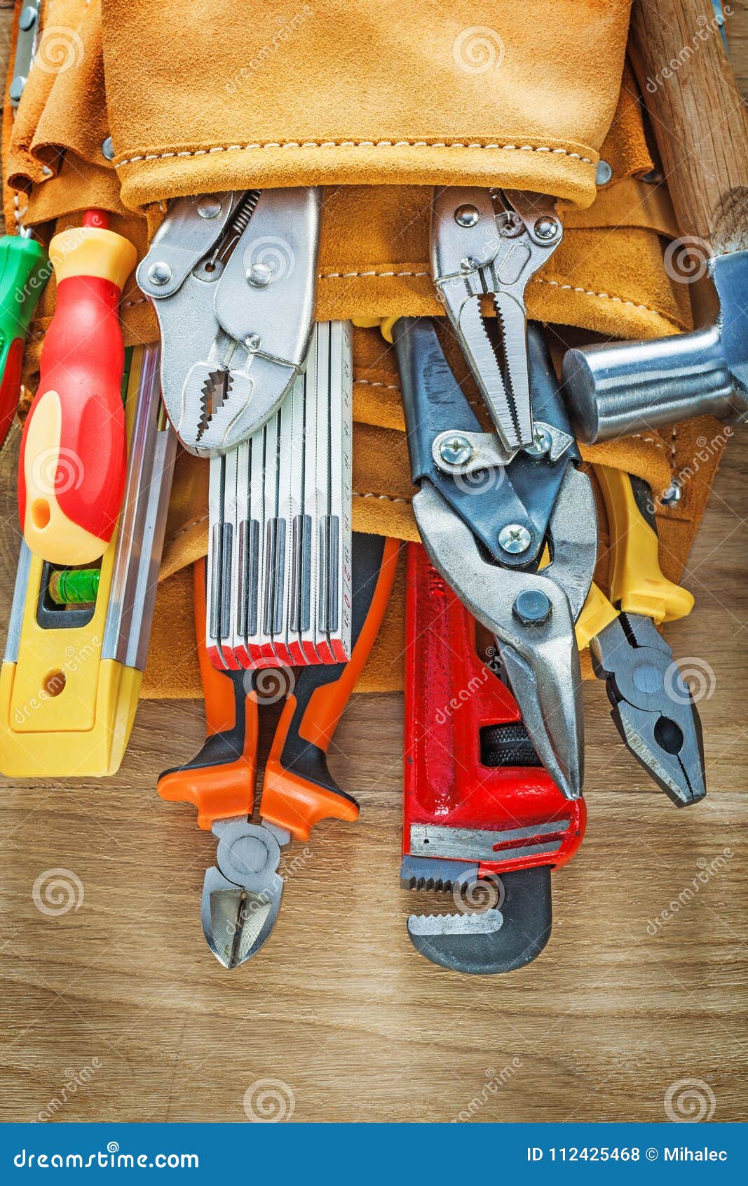 Construction Tools in Leather Building Belt on Wood Board Stock Photo ...