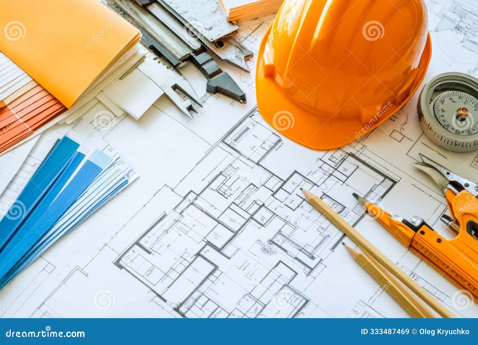Construction Tools and Plans Layout on the Table. an Orange Hard Hat ...
