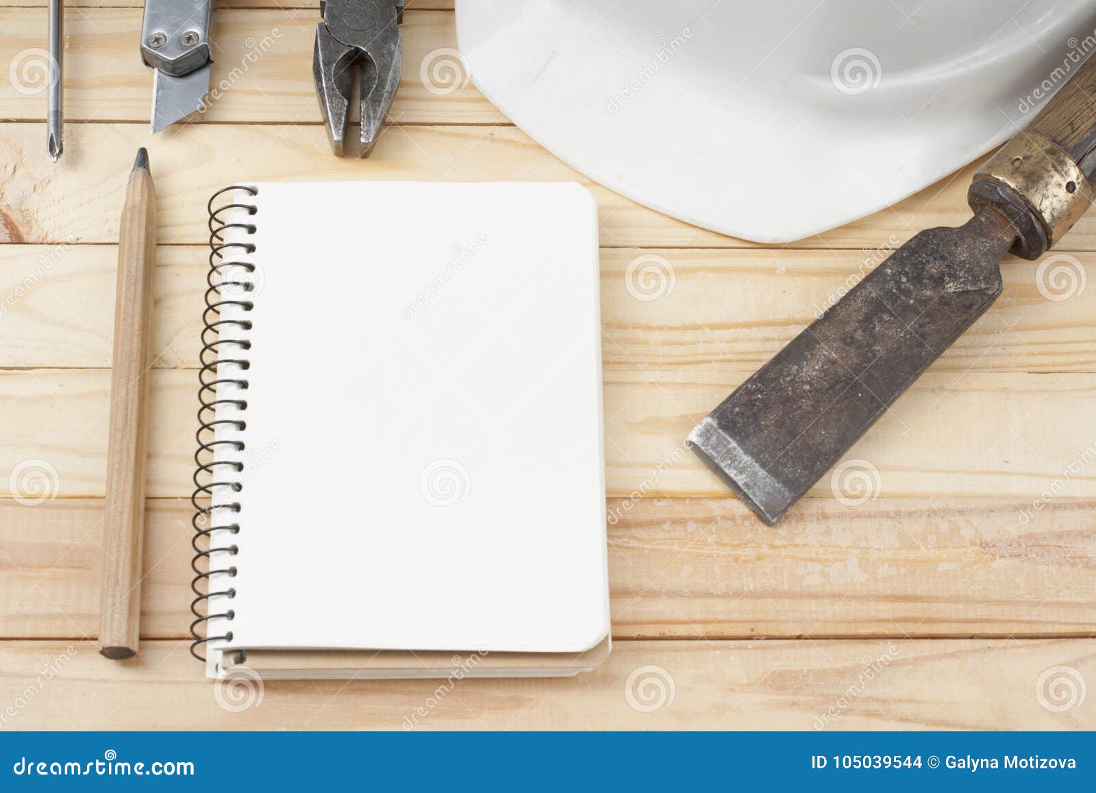 Construction Concept.Work Tools, White Helmet, Notepad and Pencil on ...