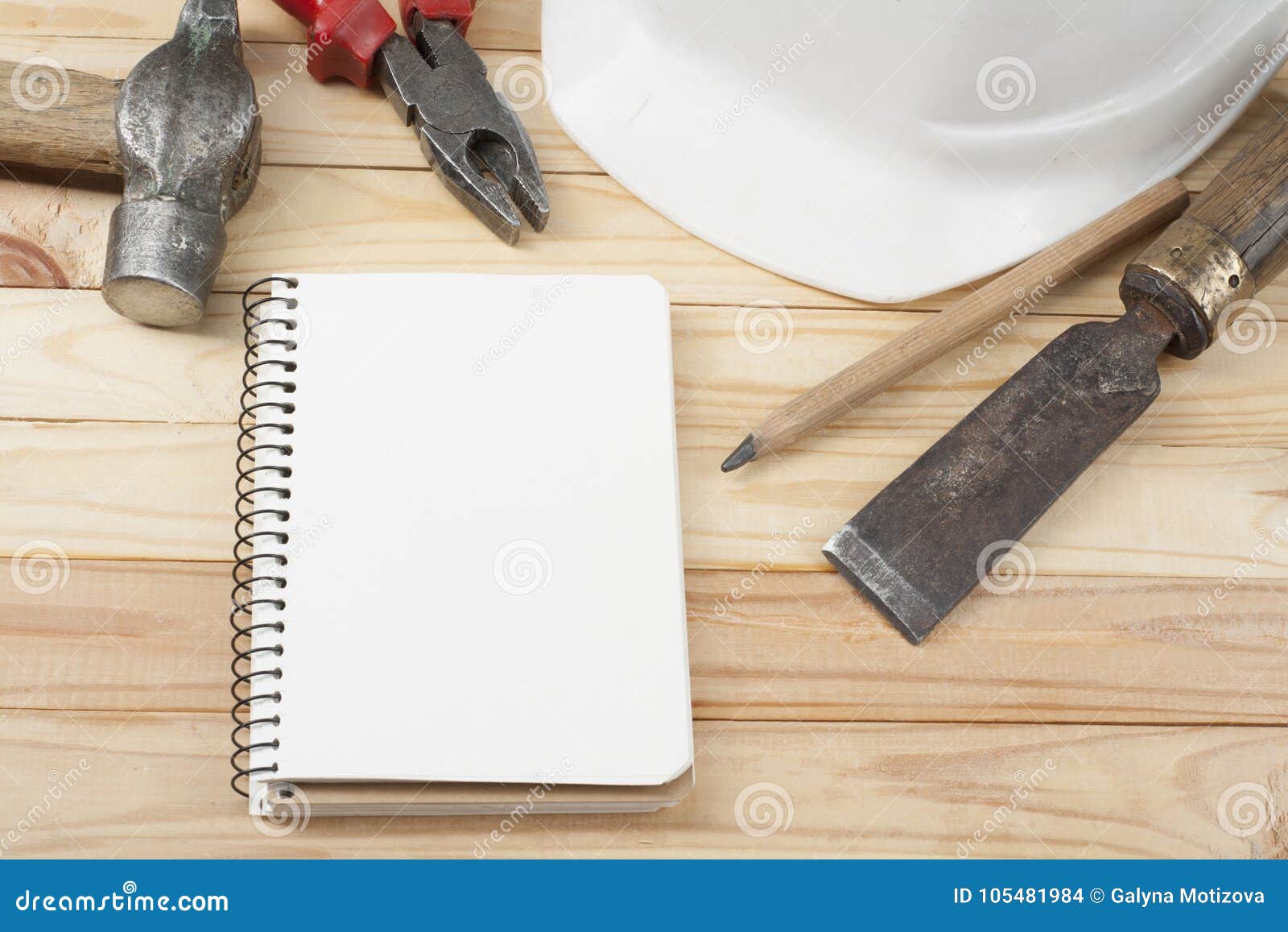 Construction Concept.Work Tools, White Helmet, Notepad and Pencil on ...