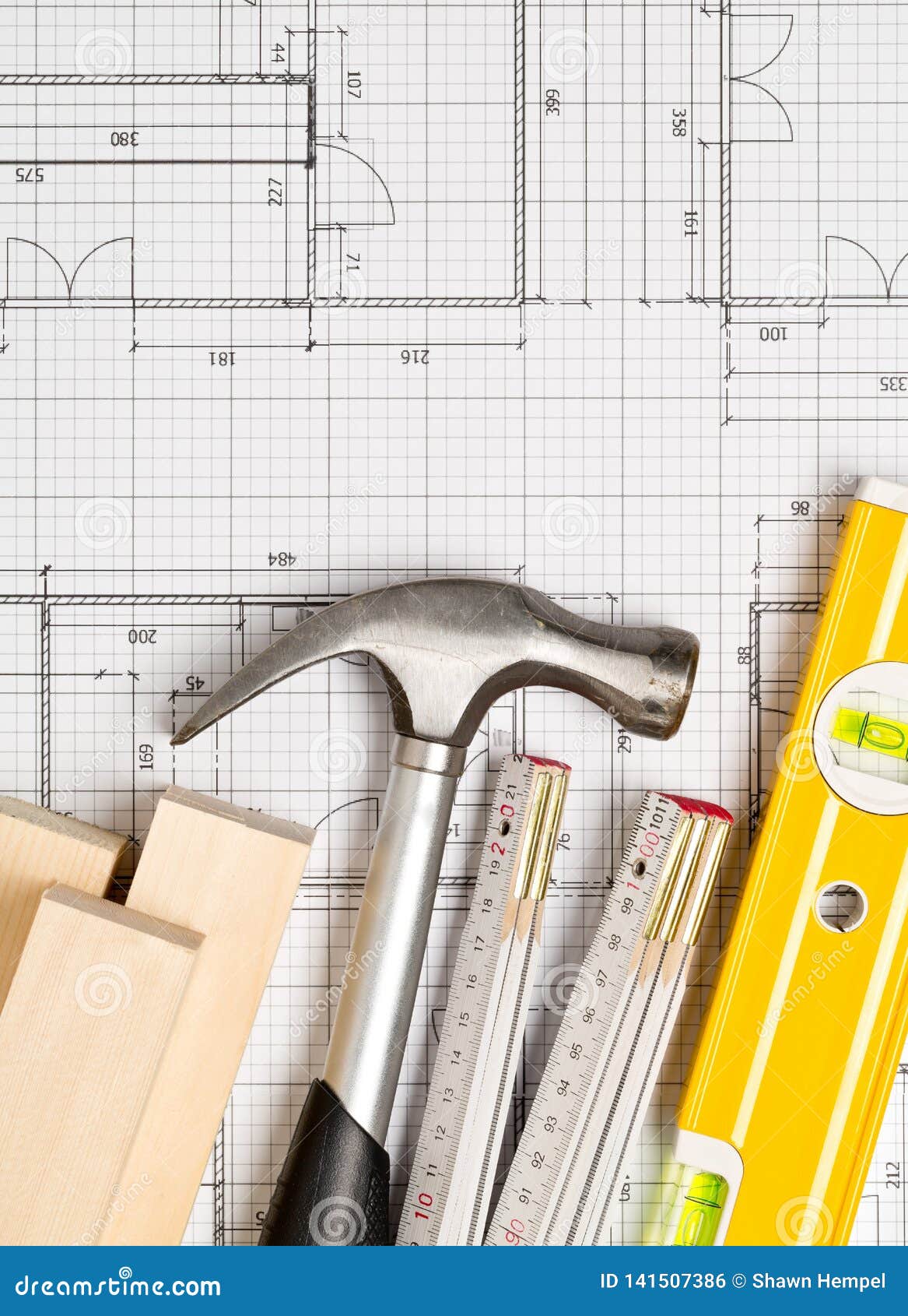 Construction Tools and Wooden Strips on Architectural Blueprint House ...