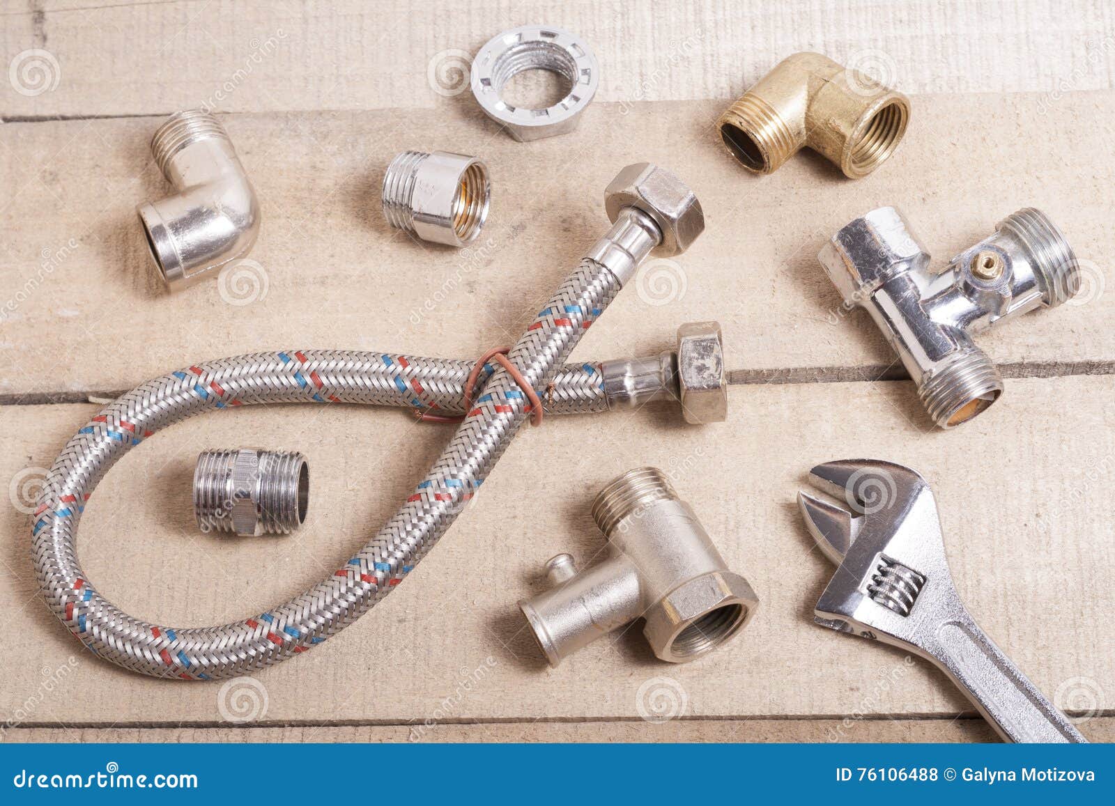 Sanitary Engineering Service. Plumber In Uniform Repairing Kitchen Sink ...