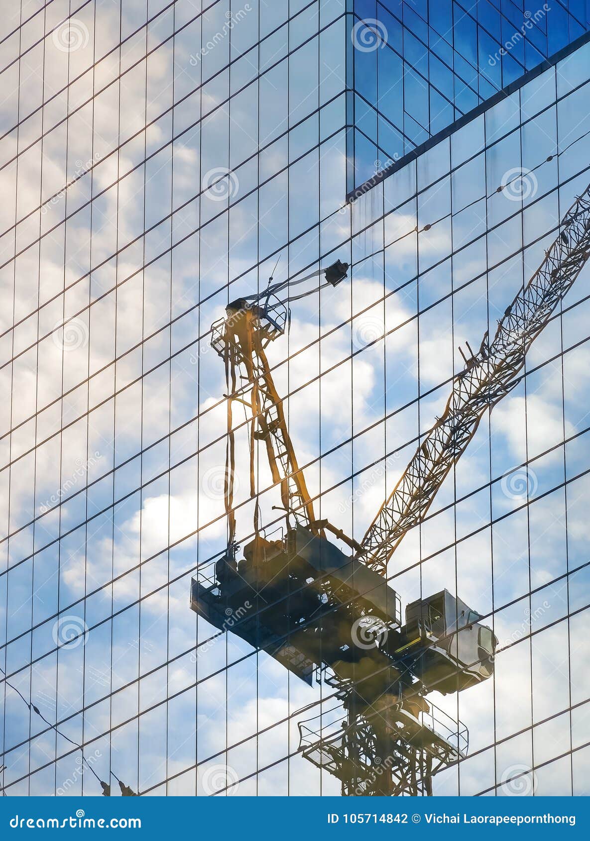 Construction Tower Cane Reflected on the Glass Office Building. Stock ...