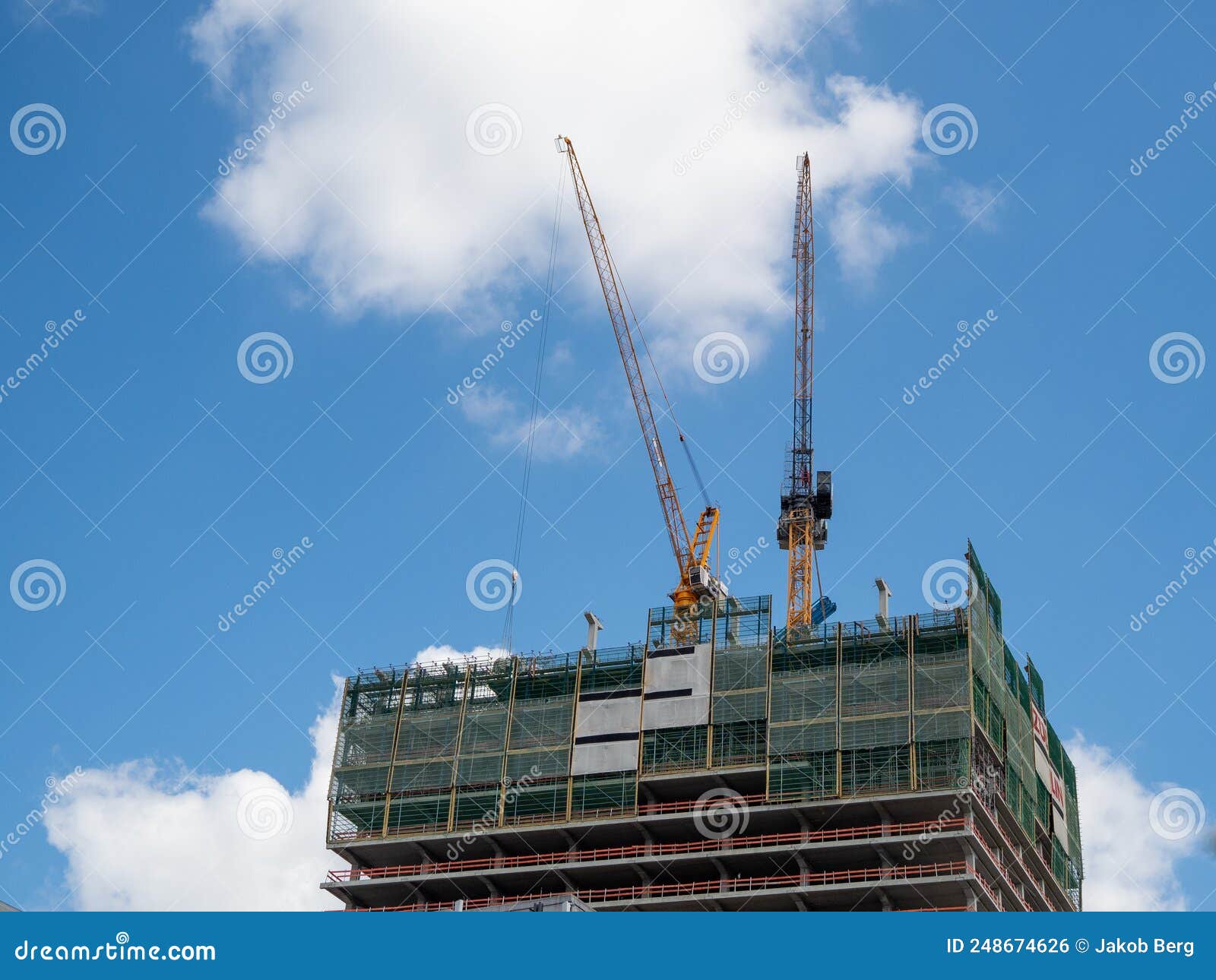Construction. Tower Crane at the Construction Site of a High-rise ...