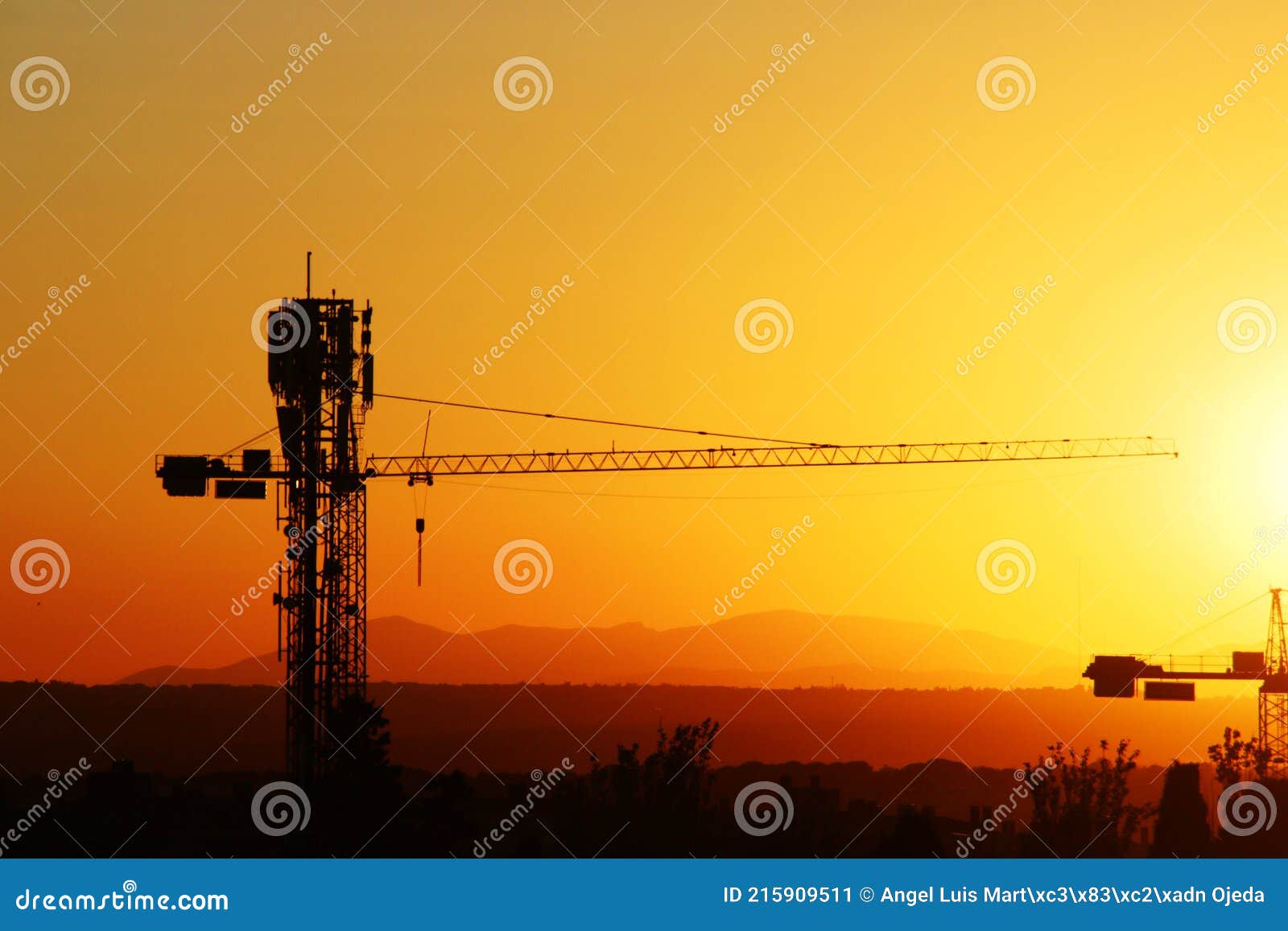 Construction Tower Crane at Sunset. Stock Image - Image of halo ...
