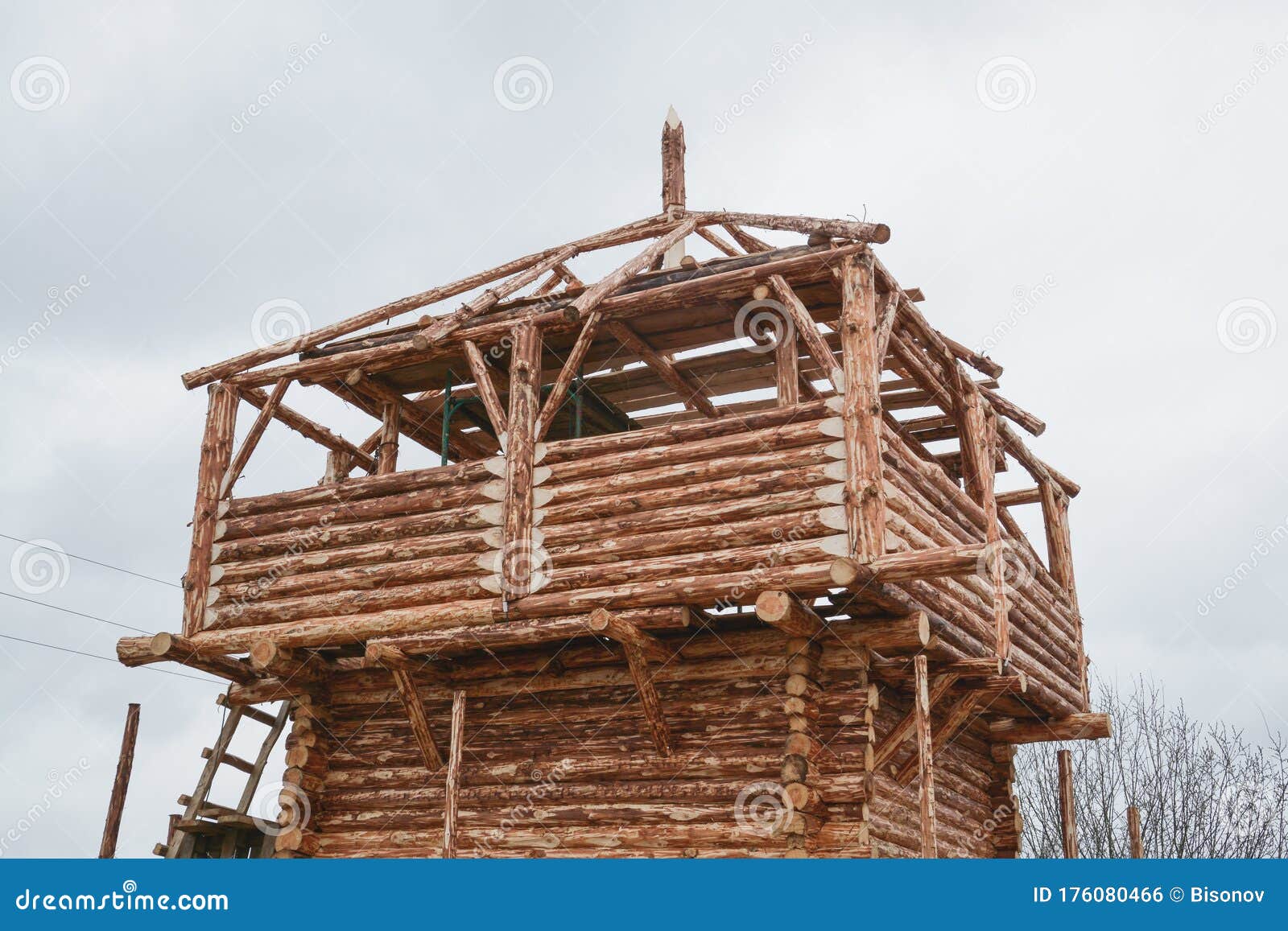 Construction of a Tower of Logs Stock Photo - Image of built, frame ...