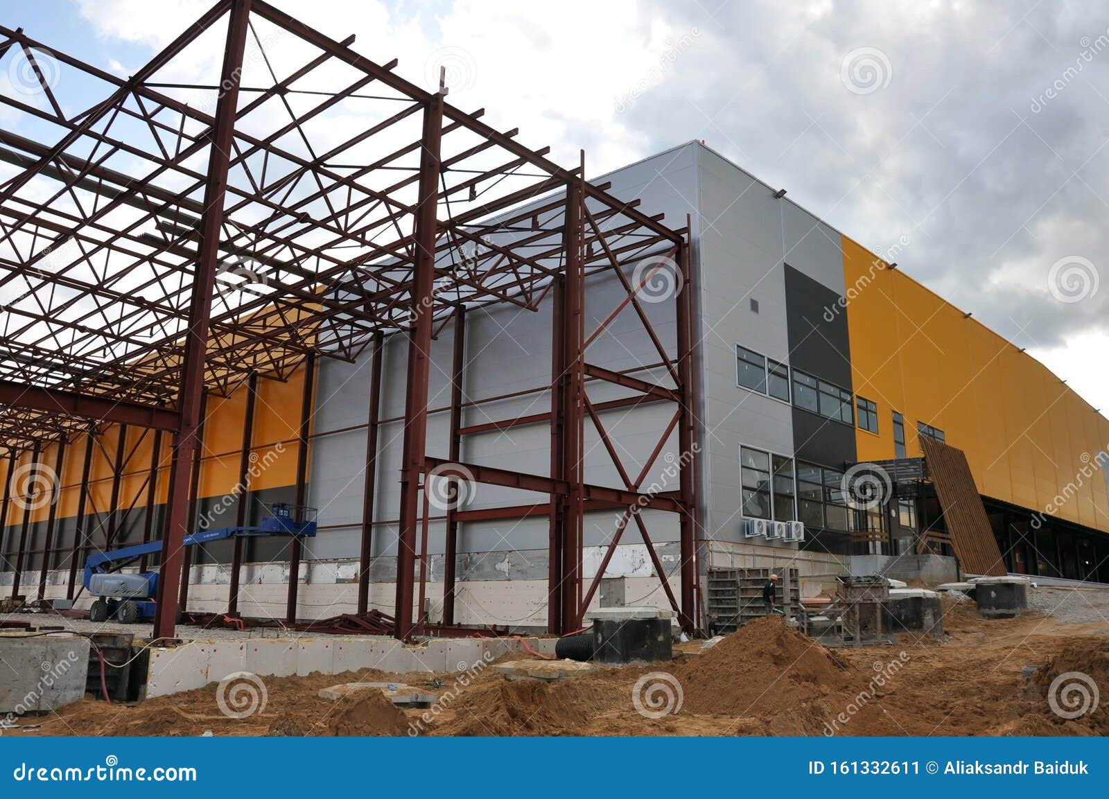 Construction of a Warehouse Building. Installation of Metal Structures ...