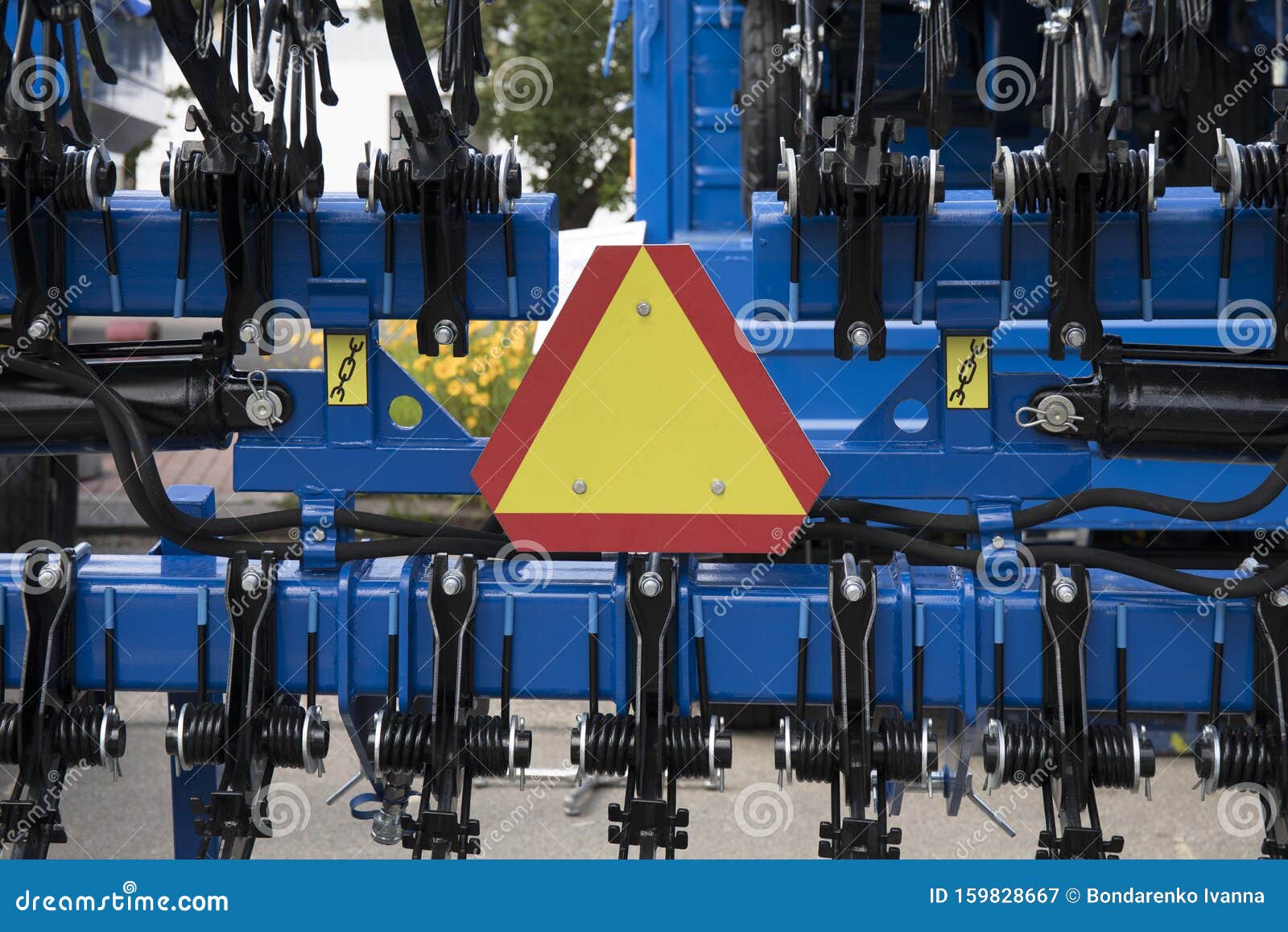 Construction Warning Sign on Blur Traffic Road on Red Metal Background ...