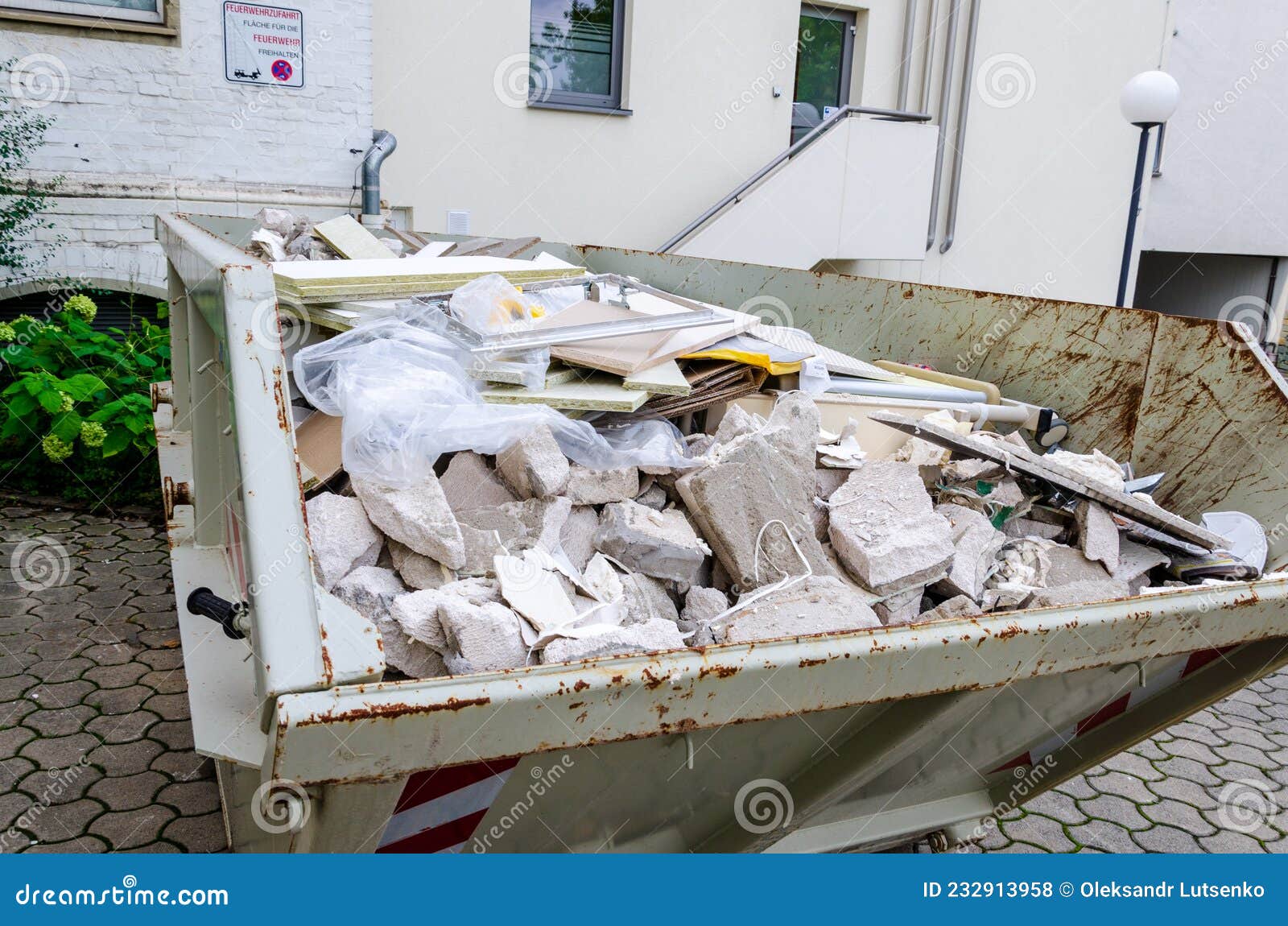 Construction Waste Container Full of Construction Waste Stock Photo ...