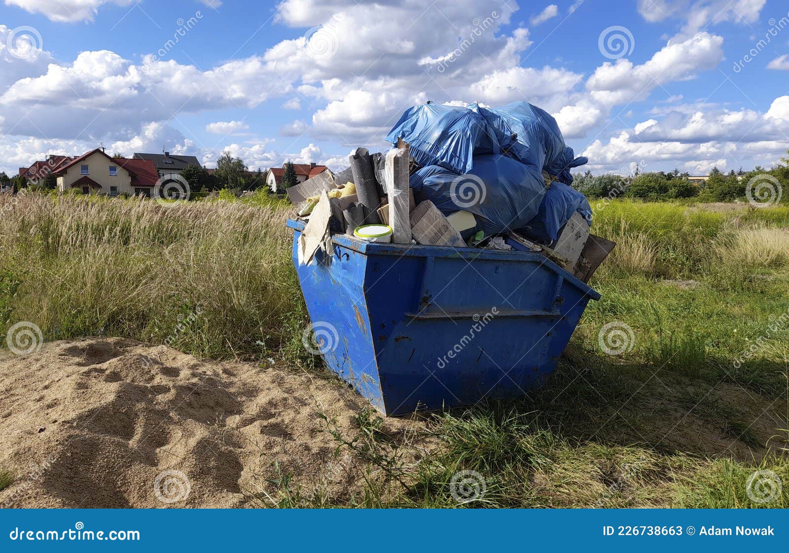 Construction Waste Container Full. on Construction Site Stock Image ...