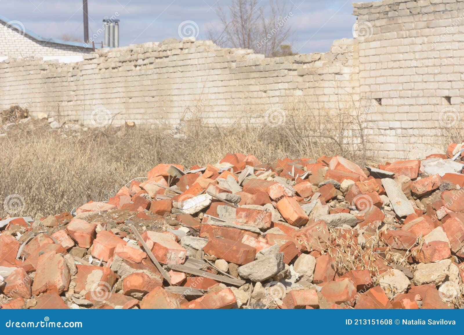 Construction Waste. Old Red Bricks in Heap on Background of Destroyed ...