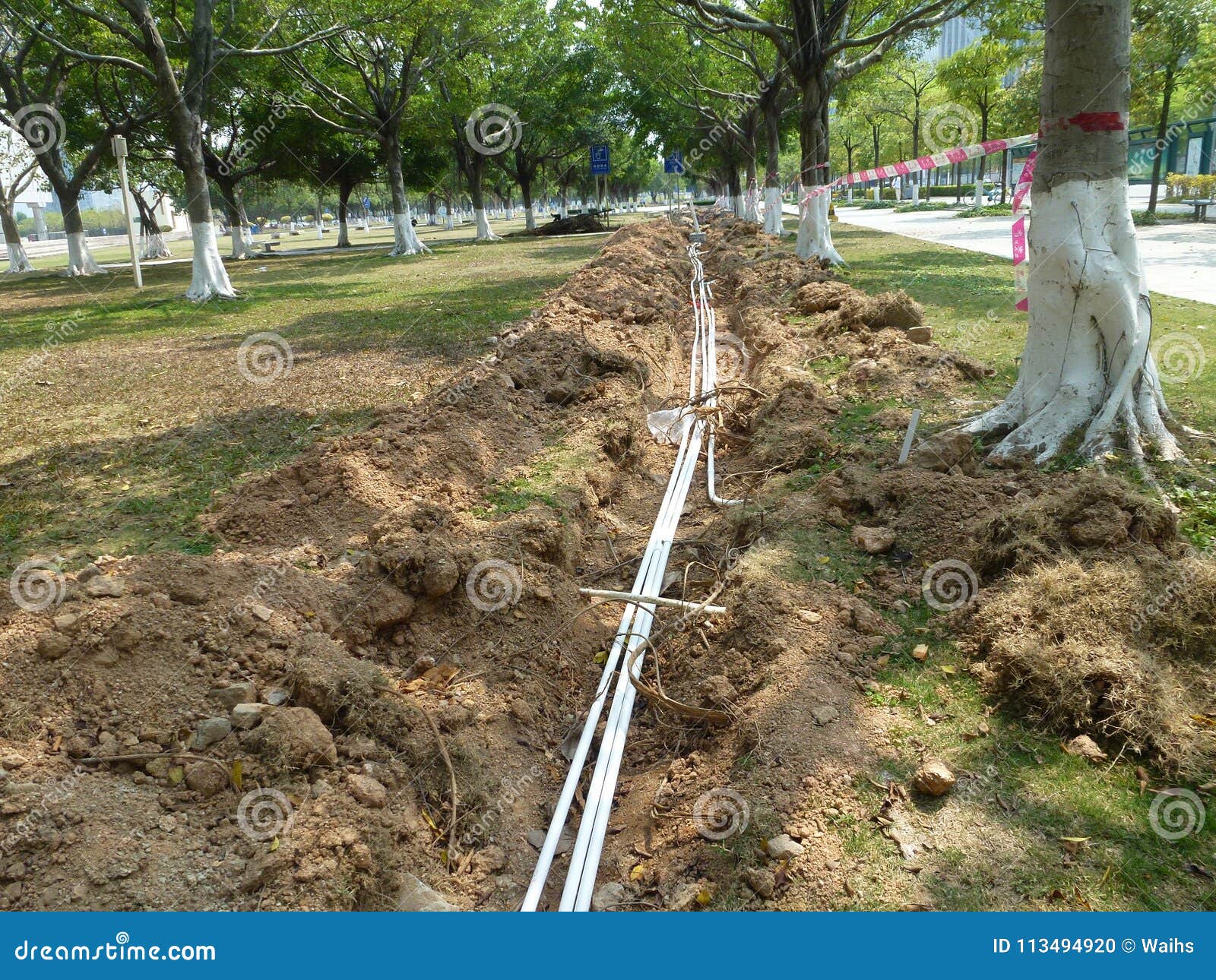 The Construction of White Plastic Water Pipe Under the Garden Ground ...