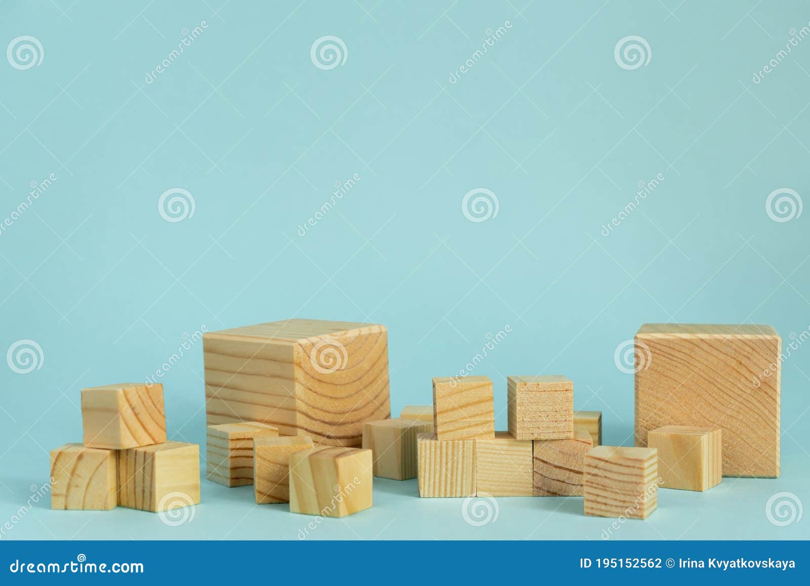 Construction of Wooden Cubes on Blue Background with Copy Space. Mockup ...