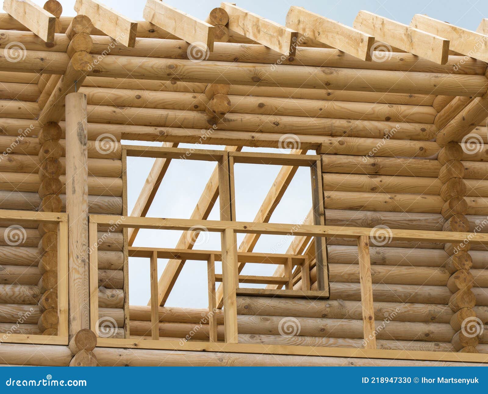 Construction of Wooden House, Feeling from a Round Log Stock Photo ...