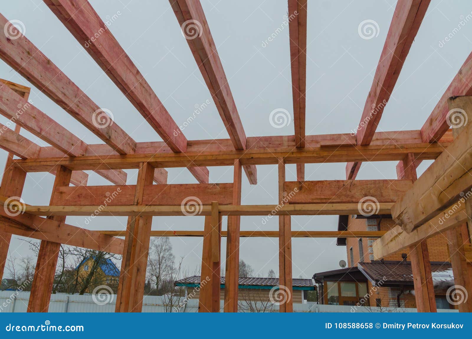 Construction of Wooden Houses on the Basis of the Framework Stock Photo ...