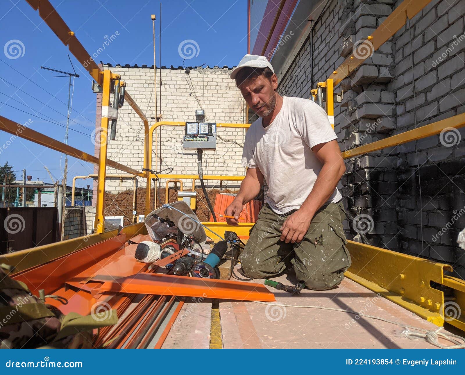 Construction Work, Fastening of the Facade and Roof Stock Photo - Image ...