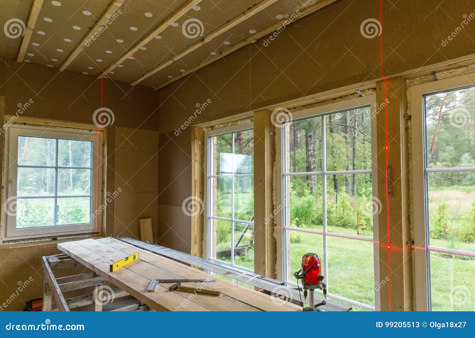 Construction Work, Finishing Work in a Wooden House and Installing ...