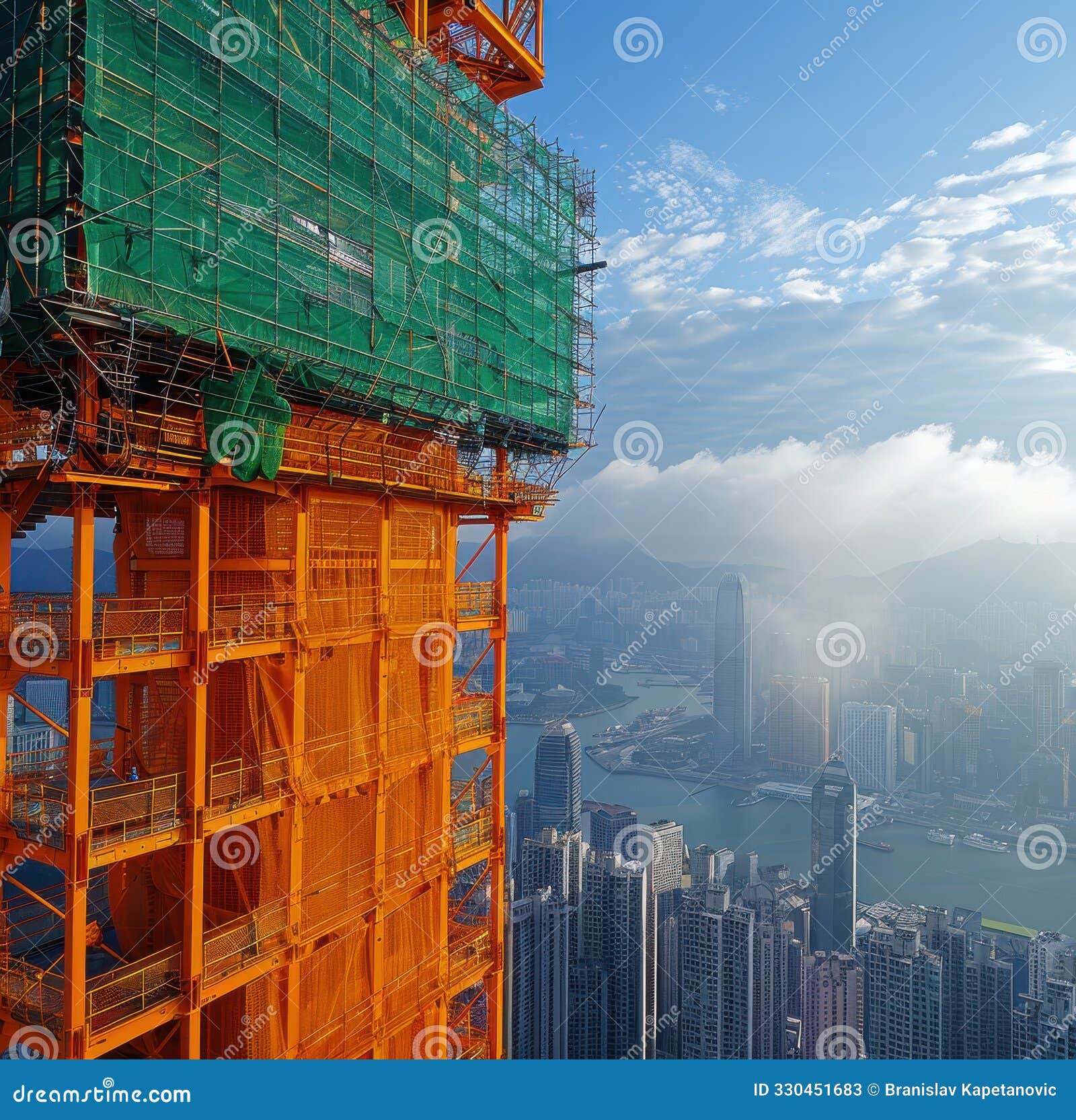 Construction Work on a High-rise Building in a City Skyline with Cranes ...