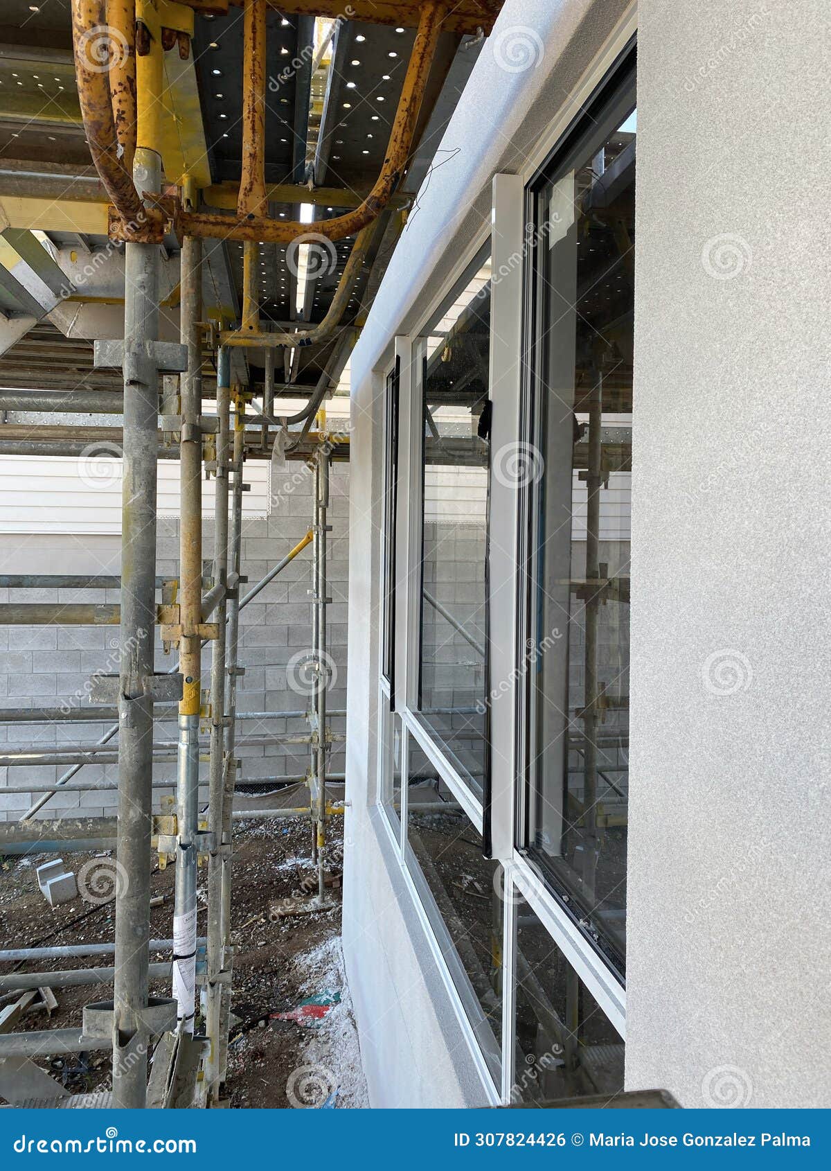 Construction Work of a House with Scaffolding and Aluminum Frame ...