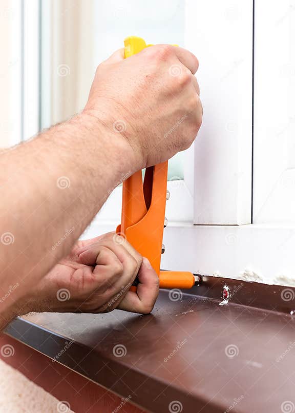 Construction Work - Installation of Rivets. Window Tint Repair. Plastic ...