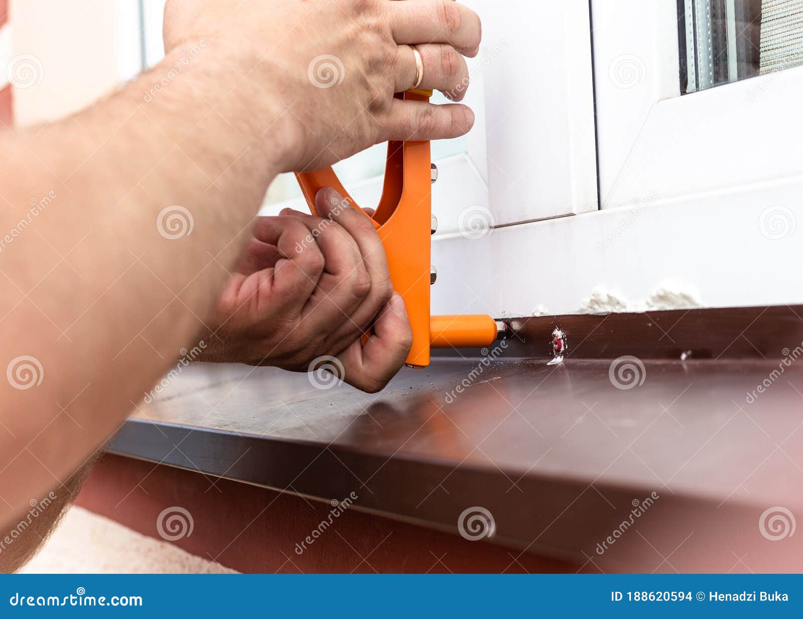 Construction Work - Installation of Rivets. Window Tint Repair. Plastic ...