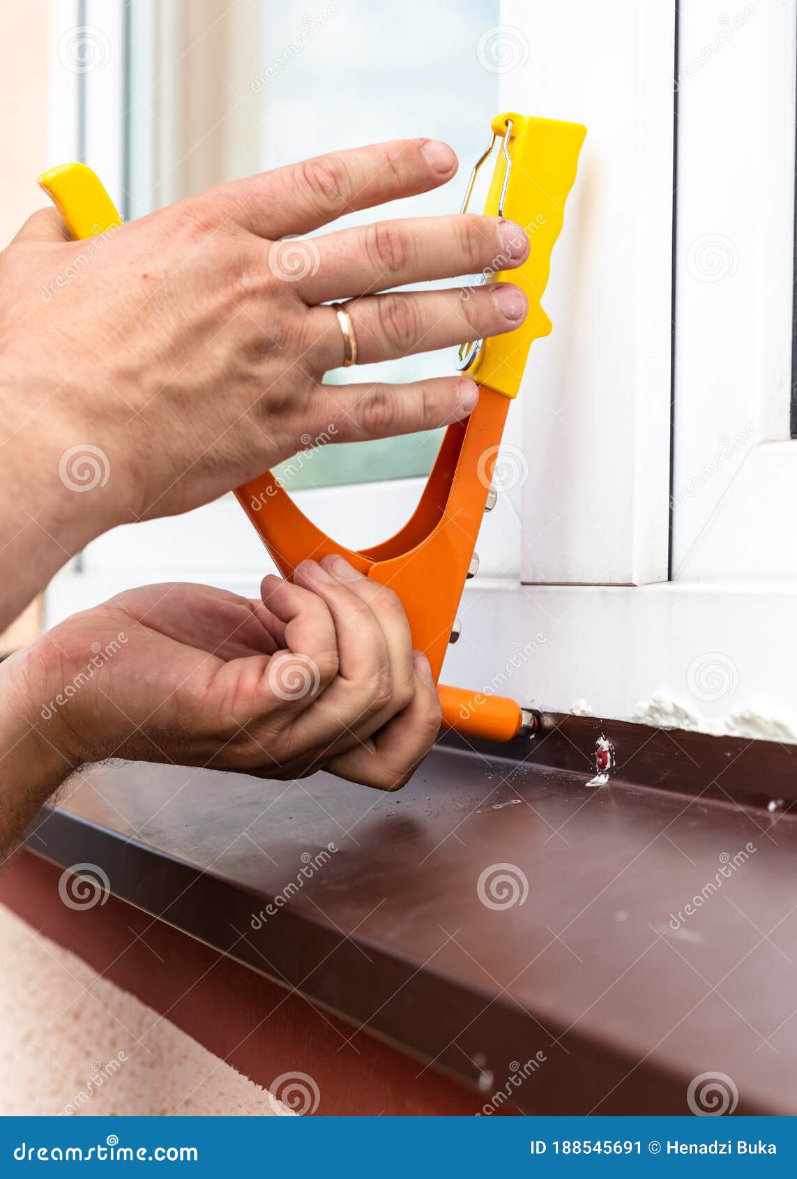 Construction Work - Installation of Rivets. Window Tint Repair. Plastic ...