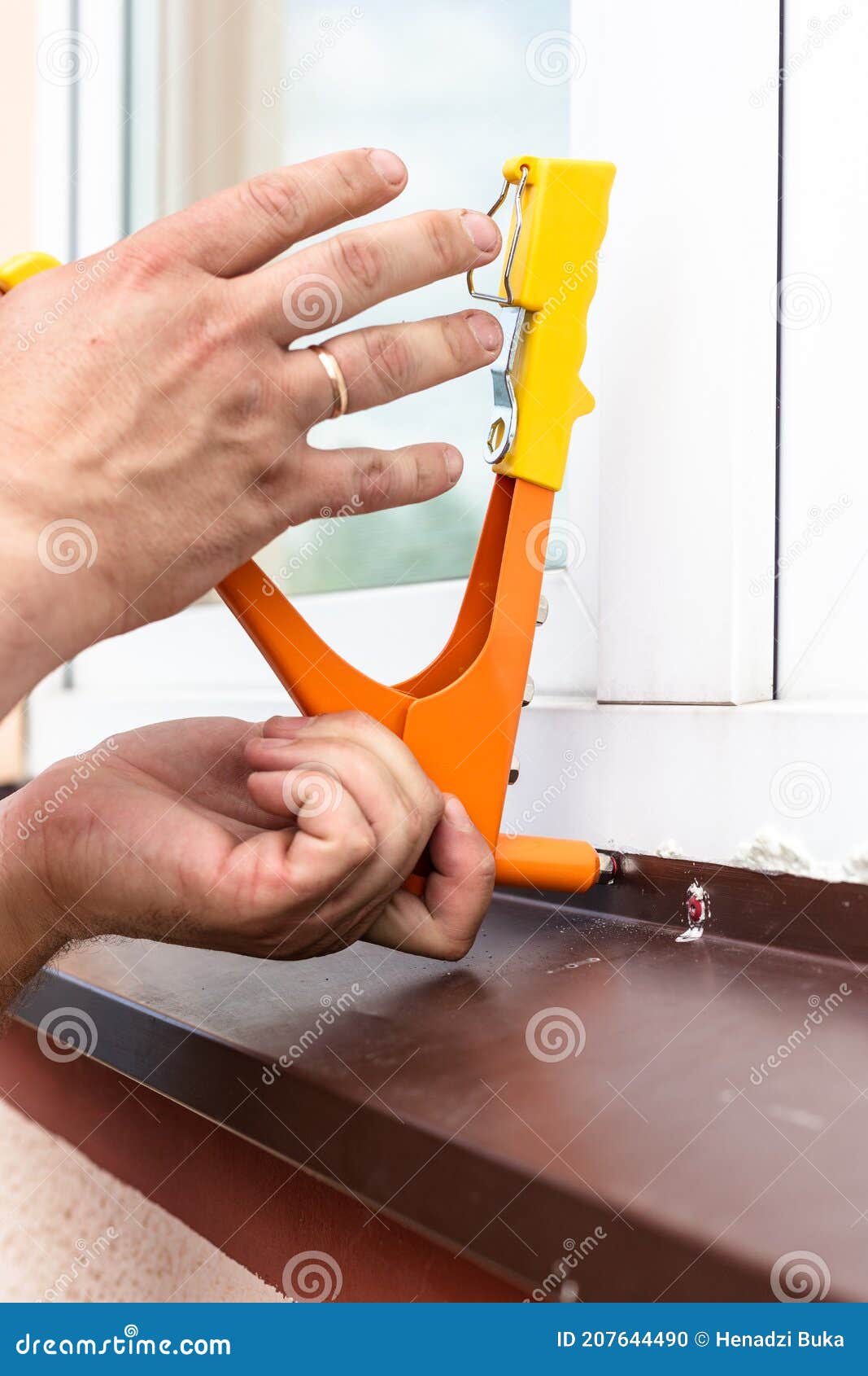 Construction Work - Installation of Rivets. Window Tint Repair. Plastic ...