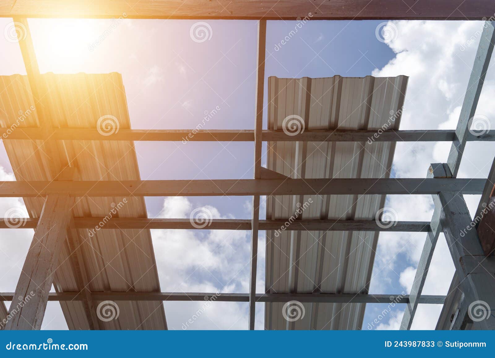 The Construction Work is Laying the Roof with Metal Sheet Stock Image ...