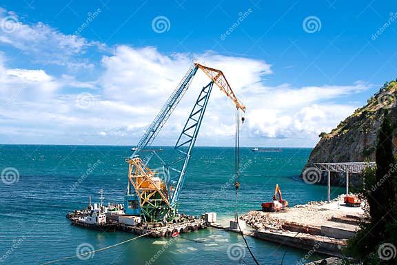 Construction work in port stock photo. Image of docked - 142192182