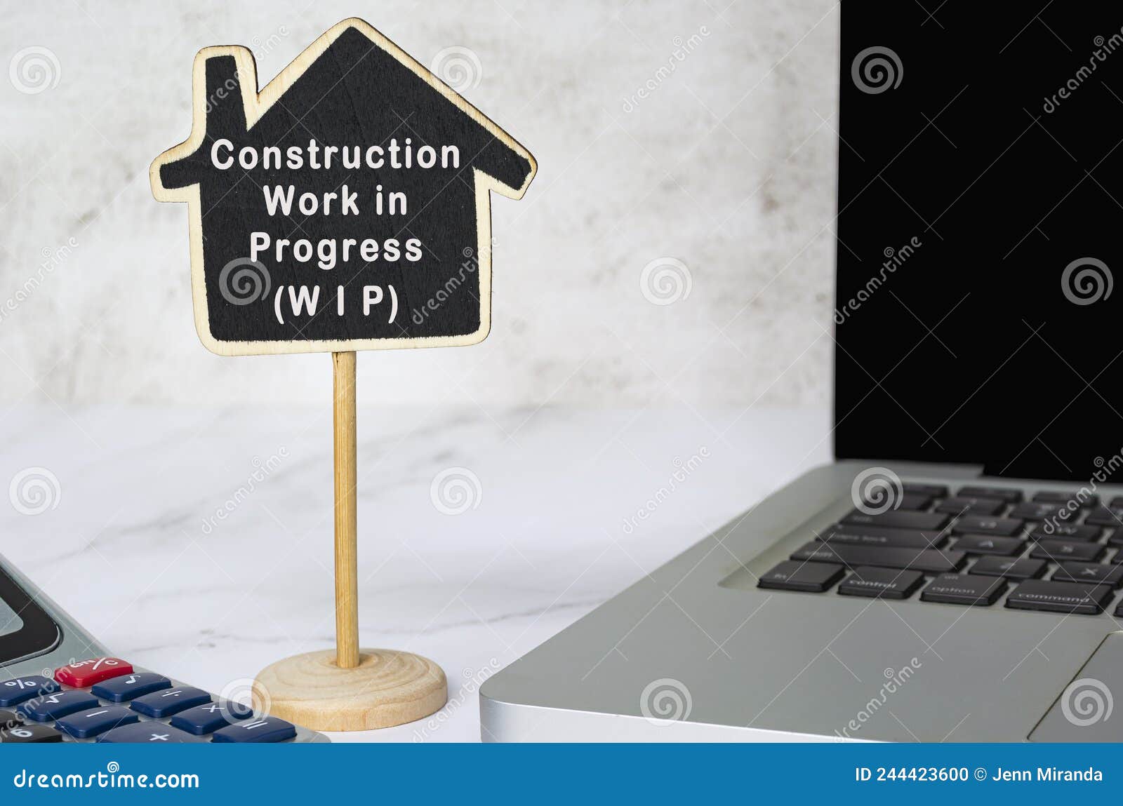 Construction Work in Progress Text on Wooden House Model with on White ...