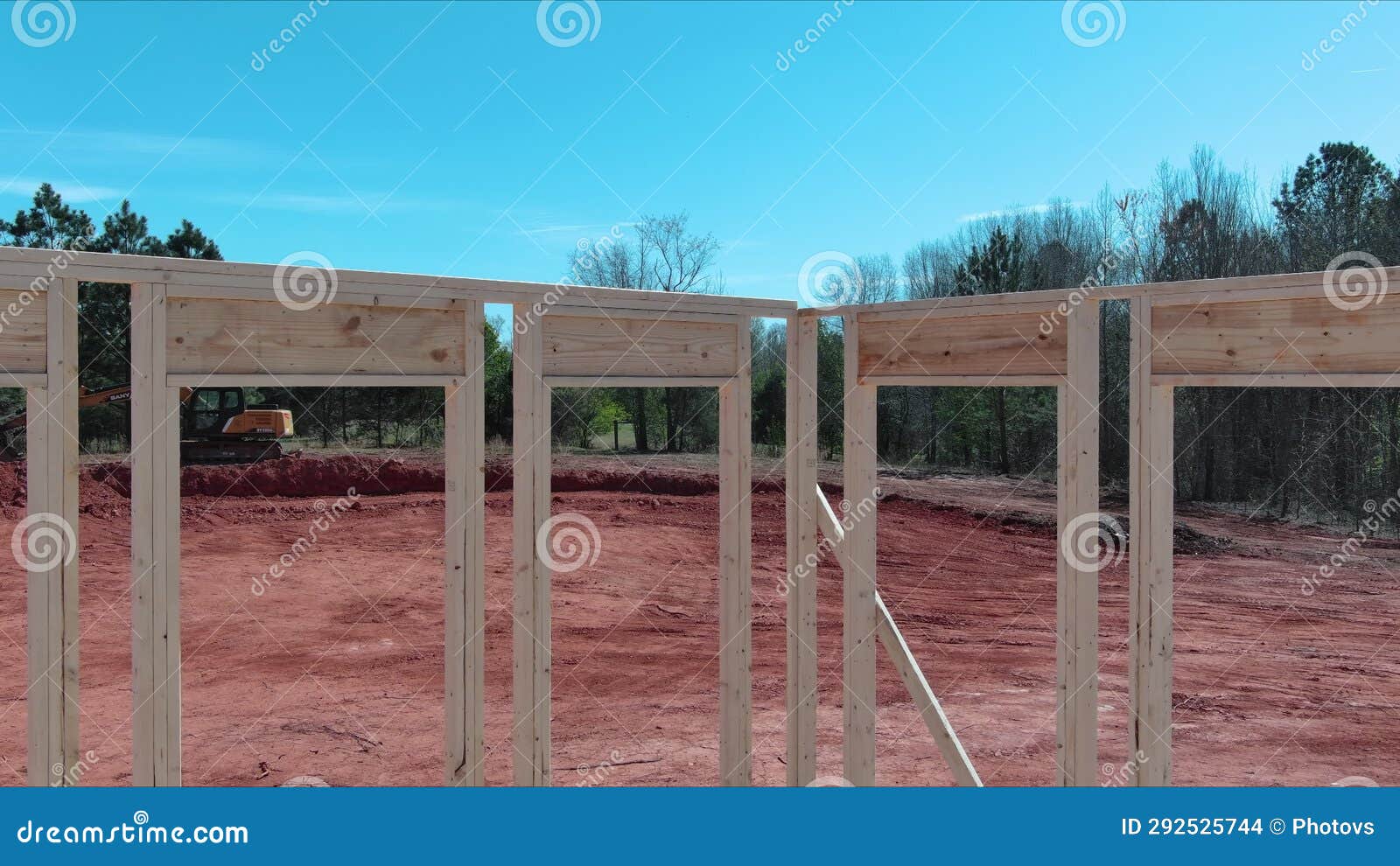 Construction Work in Progress Viewing an Unfinished House with Wooden ...