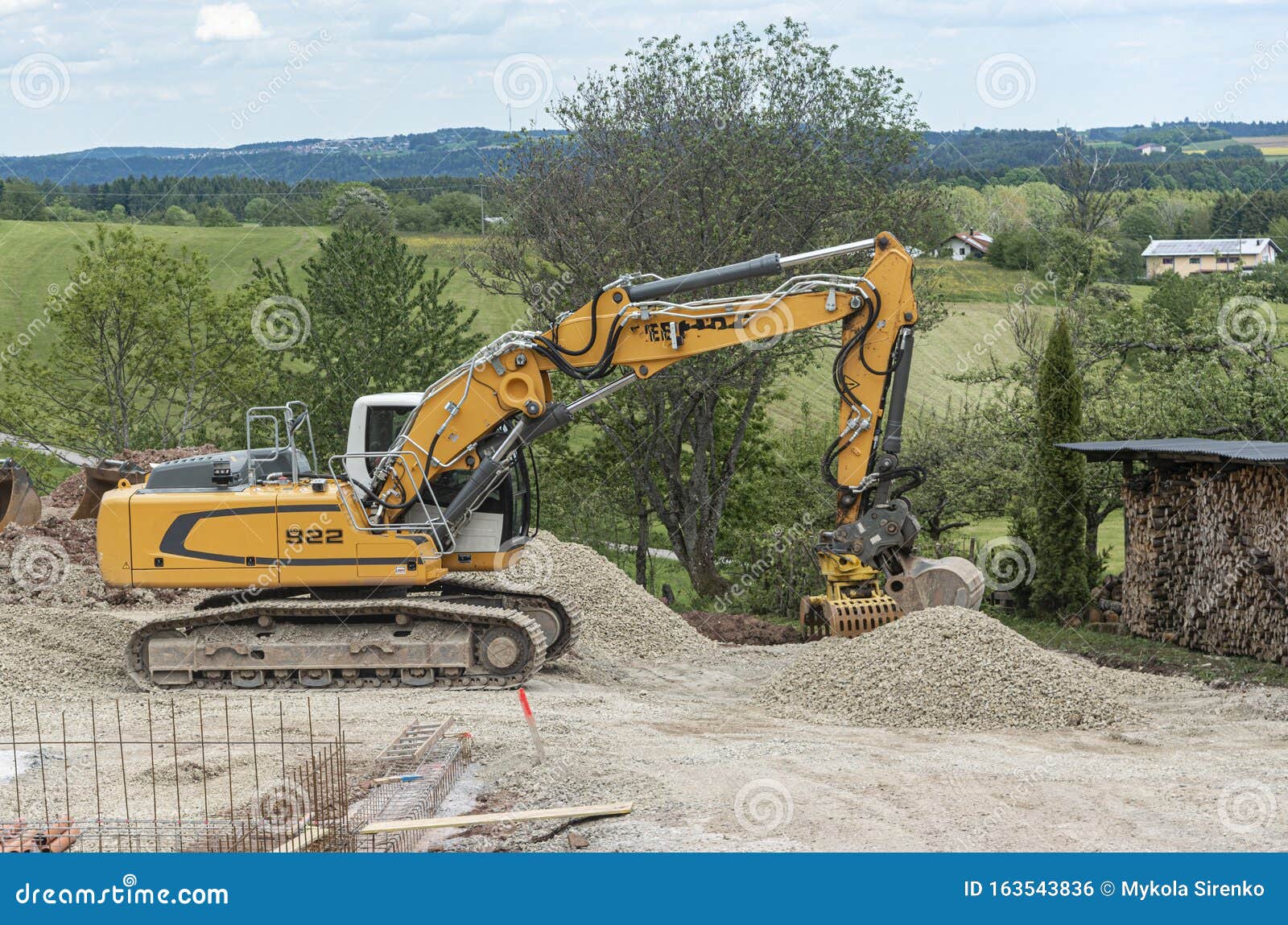 Construction Work on the Site. Escavator, Stones. Closeup Editorial ...