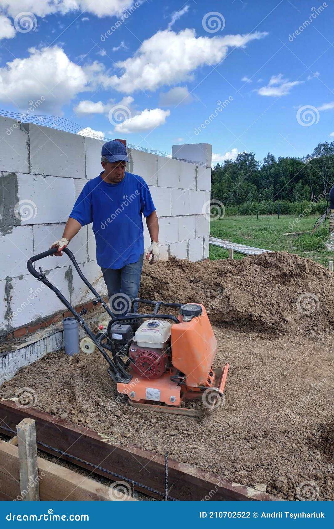 Construction Work on the Construction Site, Soil Compaction with a ...
