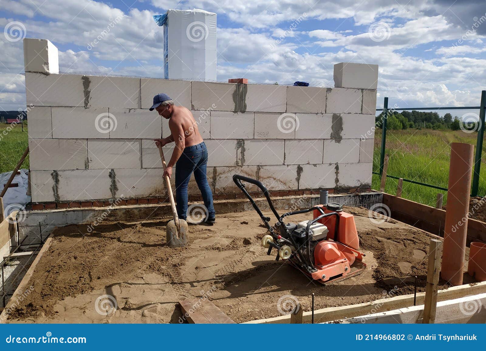 Construction Work on the Construction Site, Soil Compaction with a ...